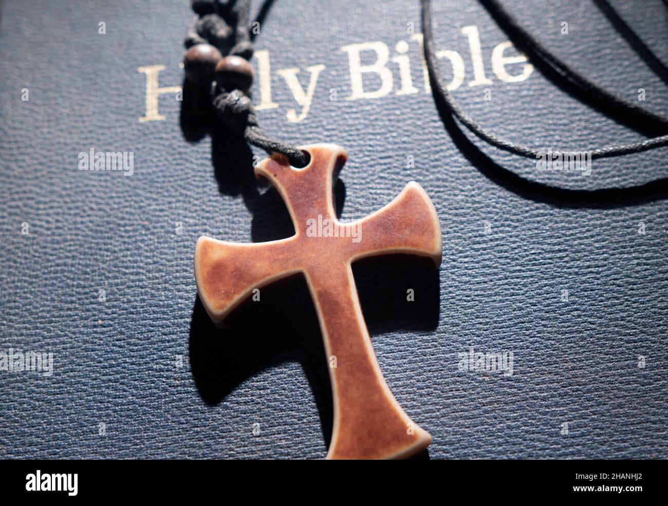 Holy Bible Christian Religion book and Cross Stock Photo - Alamy