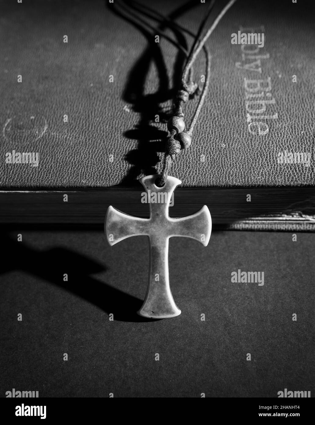 Holy Bible Christian Religion book and Cross Stock Photo - Alamy
