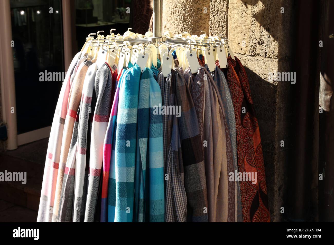 Items of clothing on display at the store for sale Stock Photo - Alamy