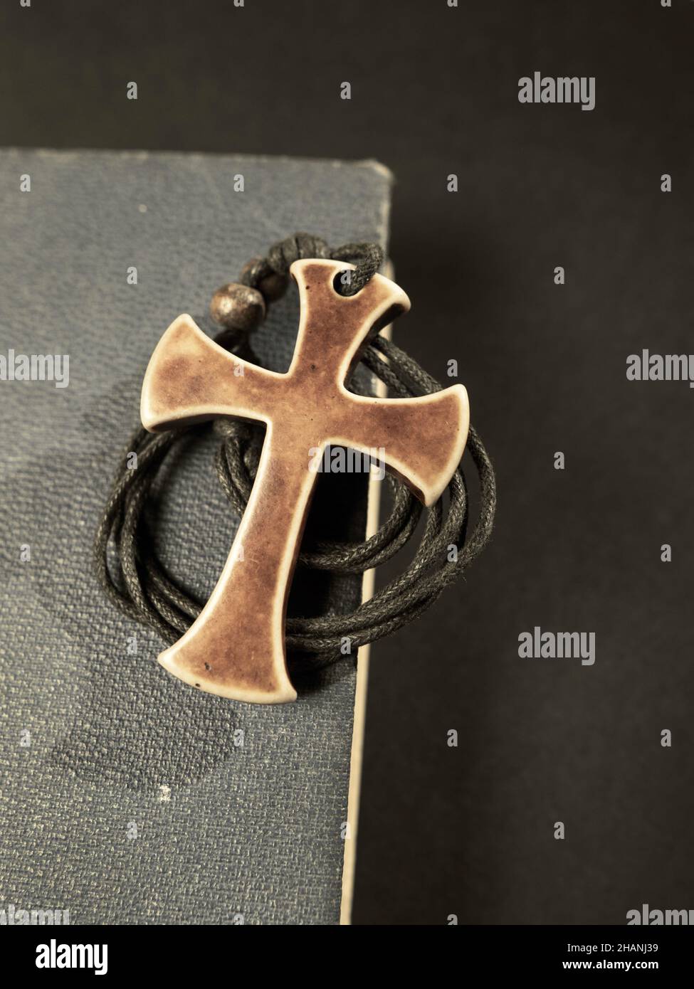 Holy Bible Christian Religion book and Cross Stock Photo - Alamy