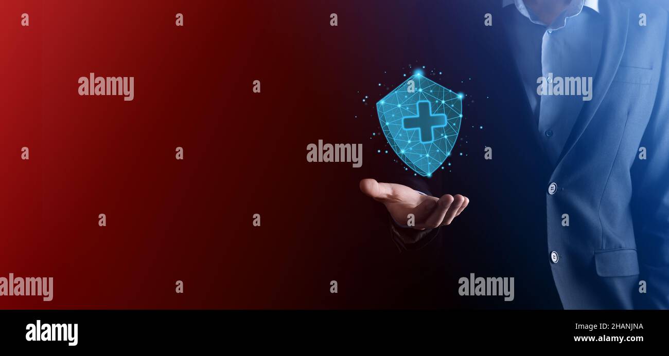 Businessman hold Shield with plus Low polygonal icon, medicine icon ...