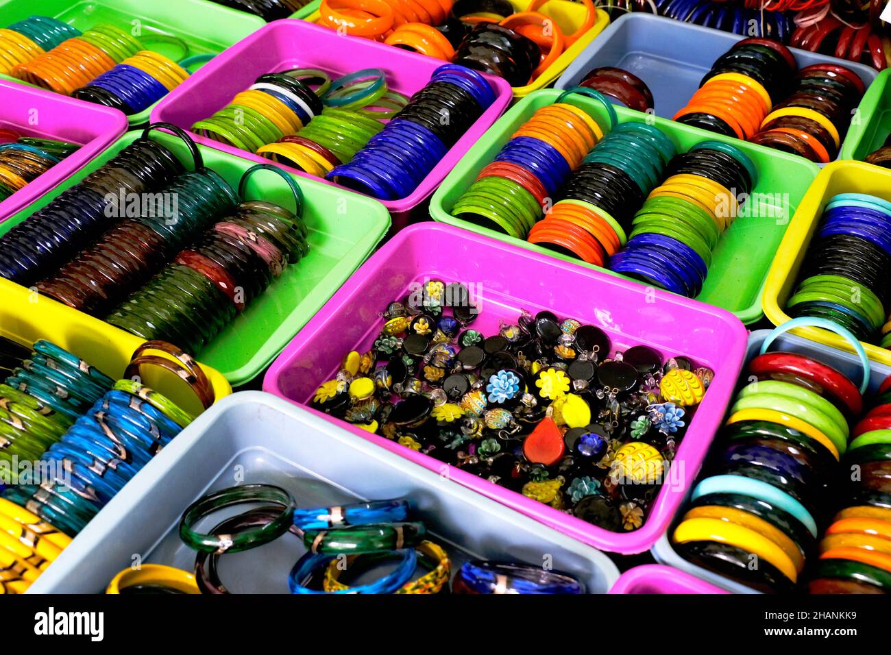Indian colorful bangles displayed in local shop in a market of Pune ...