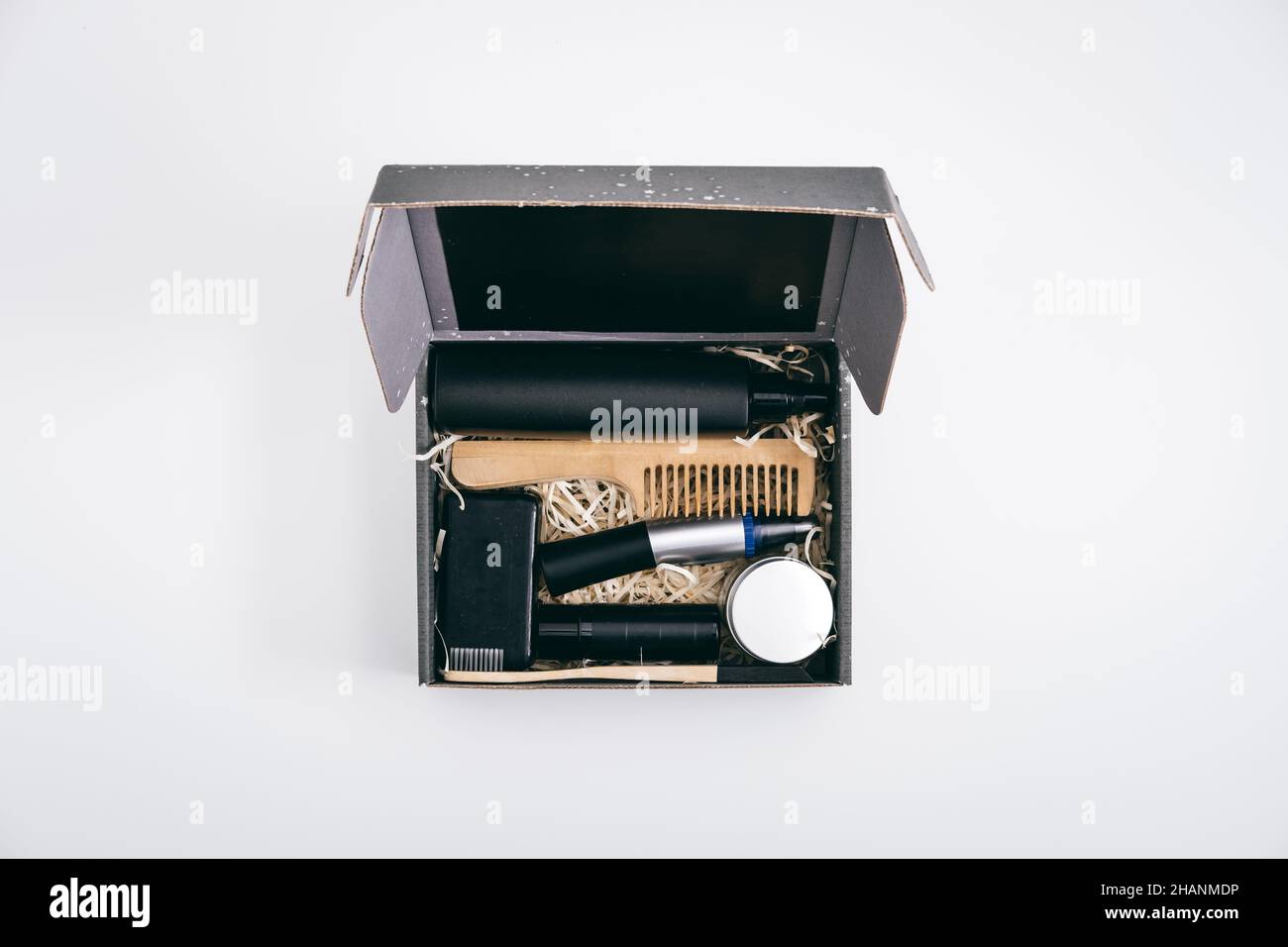Men self care kit black box with male beauty care products and devices ...