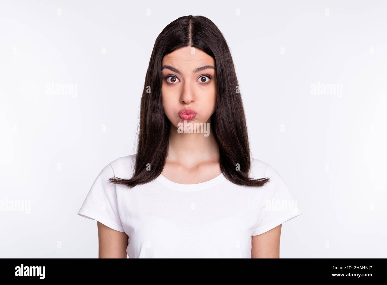 Photo of pretty childish young woman dressed casual clothes bloated ...