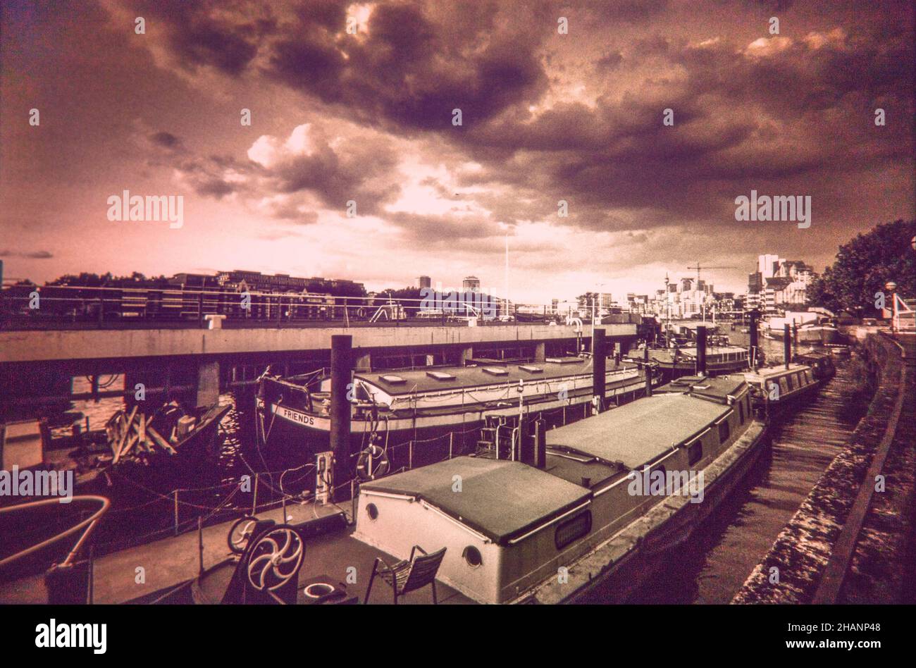 Photo-art high resolution image of barges along the Thames river at ...