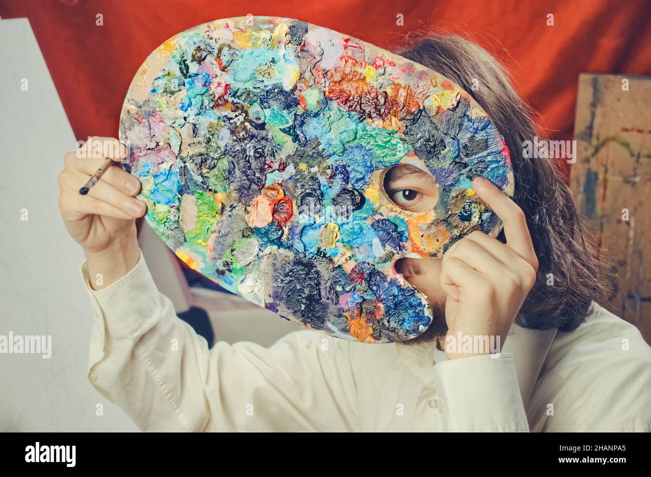 artist man holding a palette in his hands his face is closed Stock ...