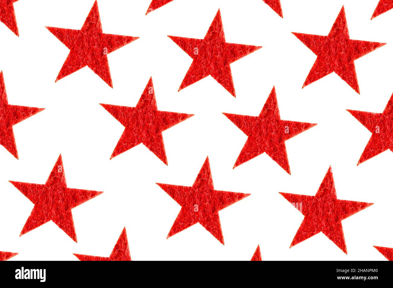 Red colored stars made of felt fabric isolated on white Stock Photo - Alamy