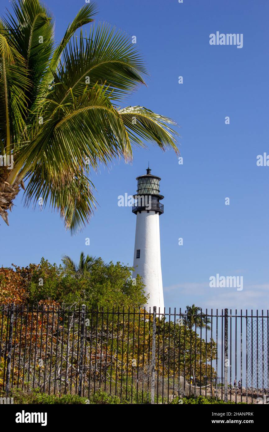 Vertical shot of the white lighthouse in Bill Baggs Cape Florida State ...