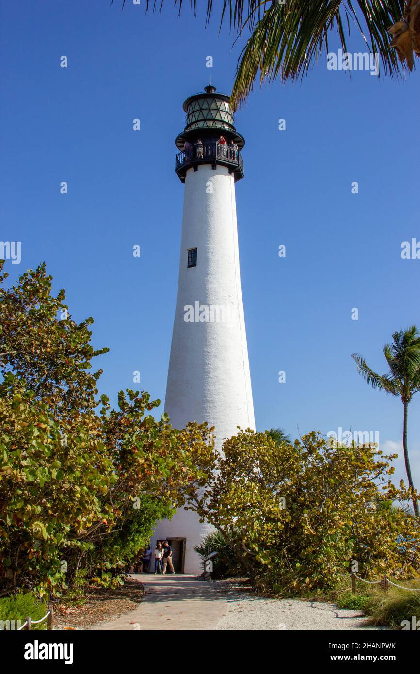 Vertical shot of the white lighthouse in Bill Baggs Cape Florida State ...