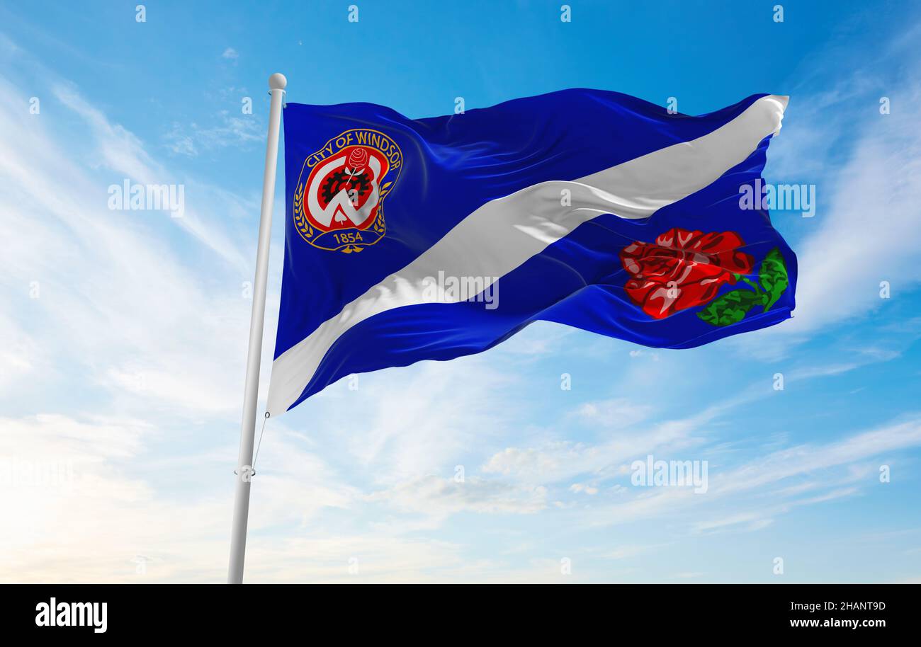 flag of Windsor, Ontario , Canada at cloudy sky background on sunset ...
