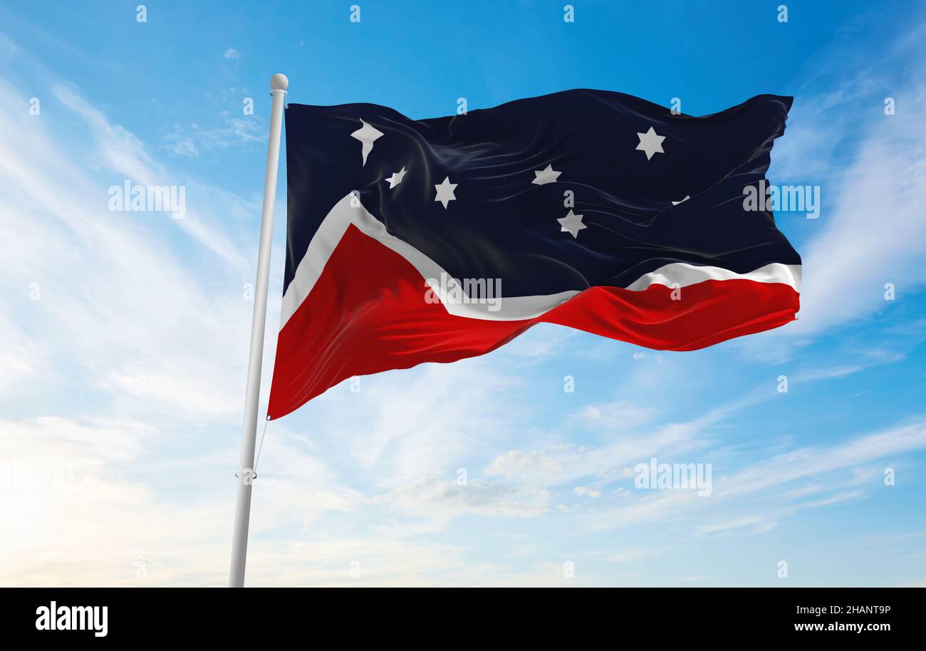 flag of Western Canada , Canada at cloudy sky background on sunset ...