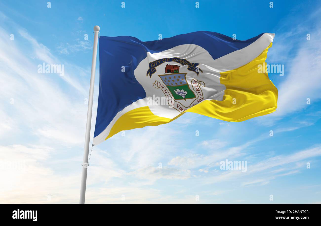 flag of Winnipeg fair , Canada at cloudy sky background on sunset ...