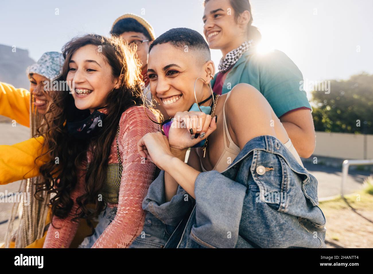 Enjoying happy friendship moments. Multiethnic group of friends smiling ...
