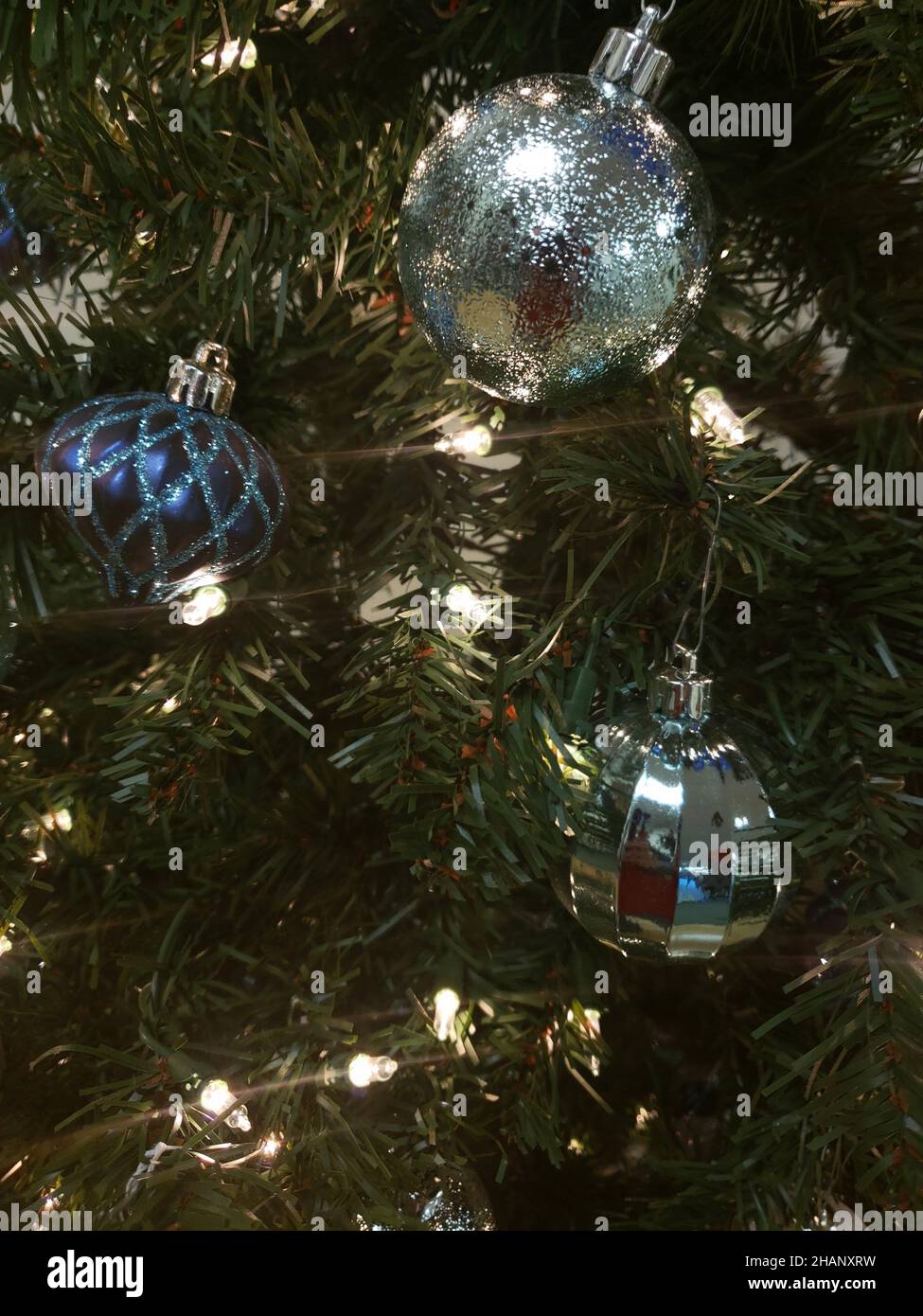 Christmas Ornaments on a Tree Stock Photo - Alamy