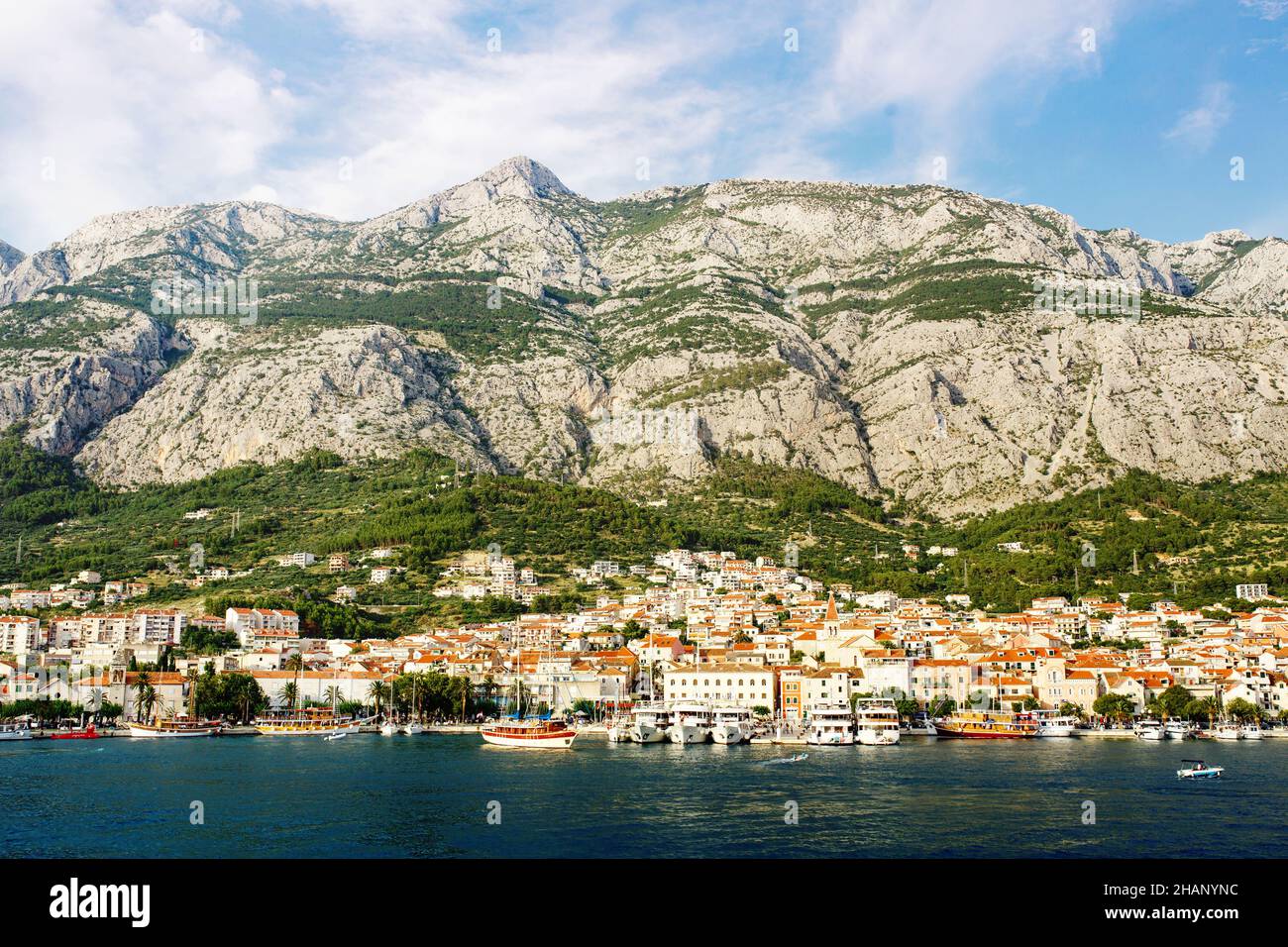 Makarska town under mountains, resort on Dalmatian coast of Adriatic ...
