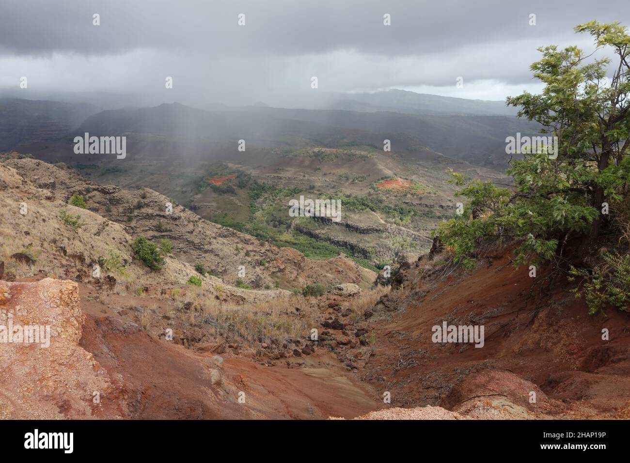 Rain falling down upon the small mountains and valleys on the outer ...