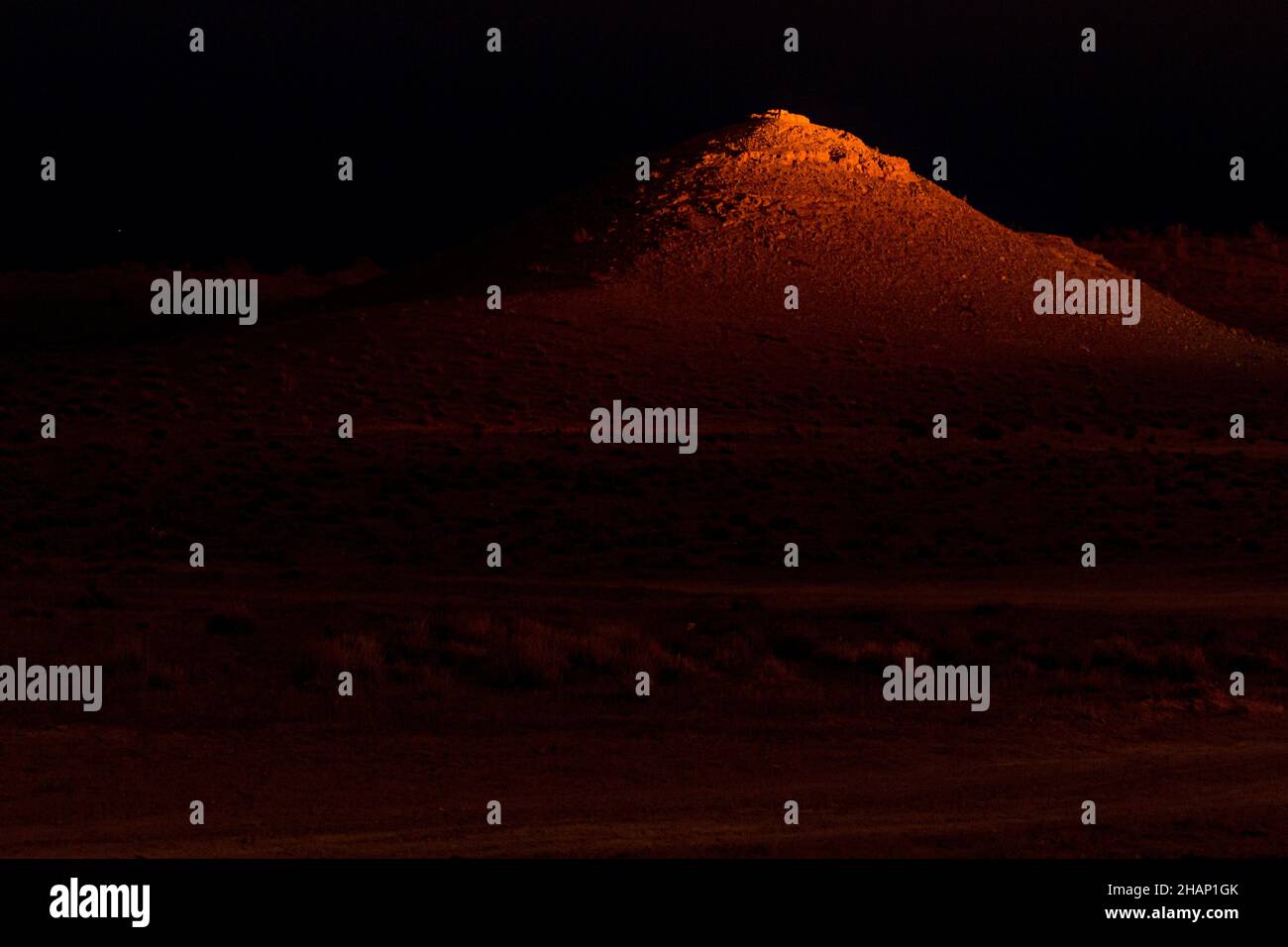Peak illuminated by the light from Darvaza Derweze gas crater Door to ...