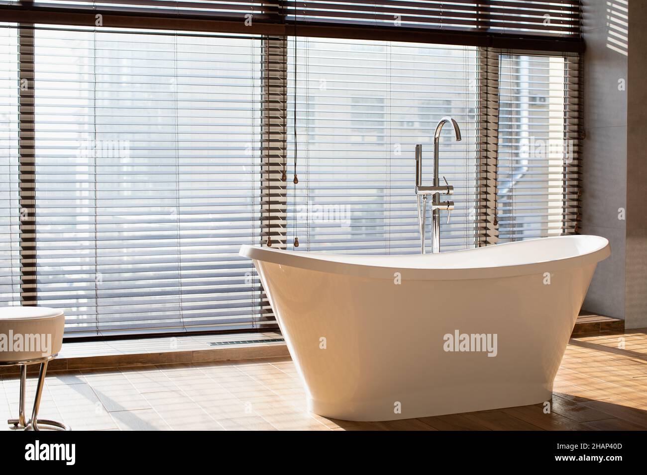 Empty bathroom with panoramic window in luxury apartment Stock Photo ...