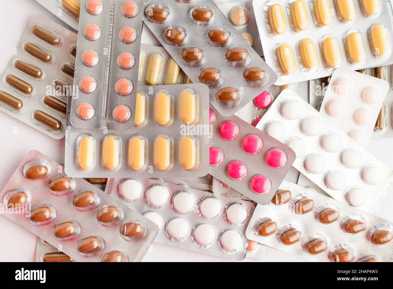 Close up of different medicine pills, tablets and vitamins isolated on ...