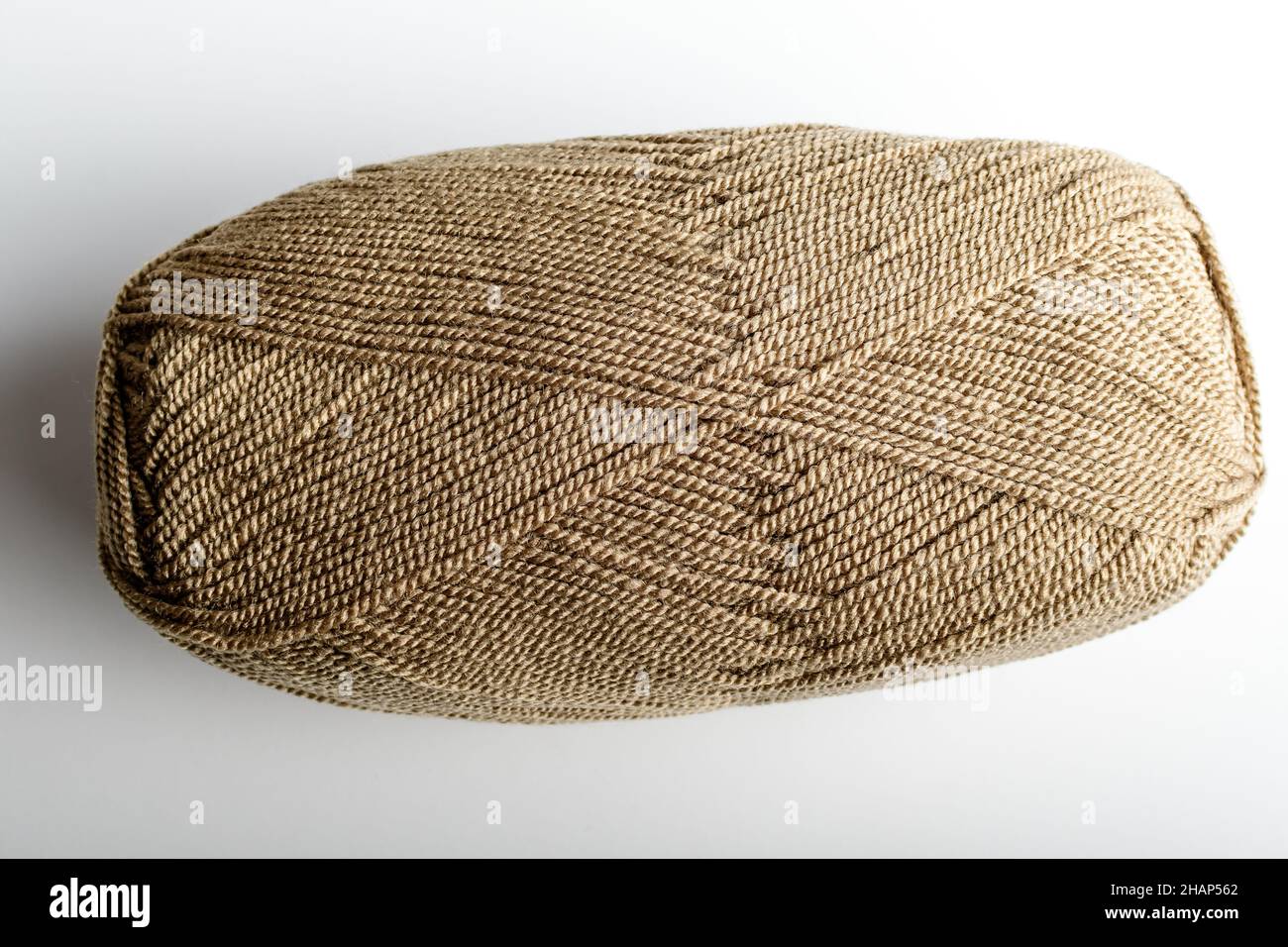 One light brown knitting wool threads for sewing or from embroidery ...