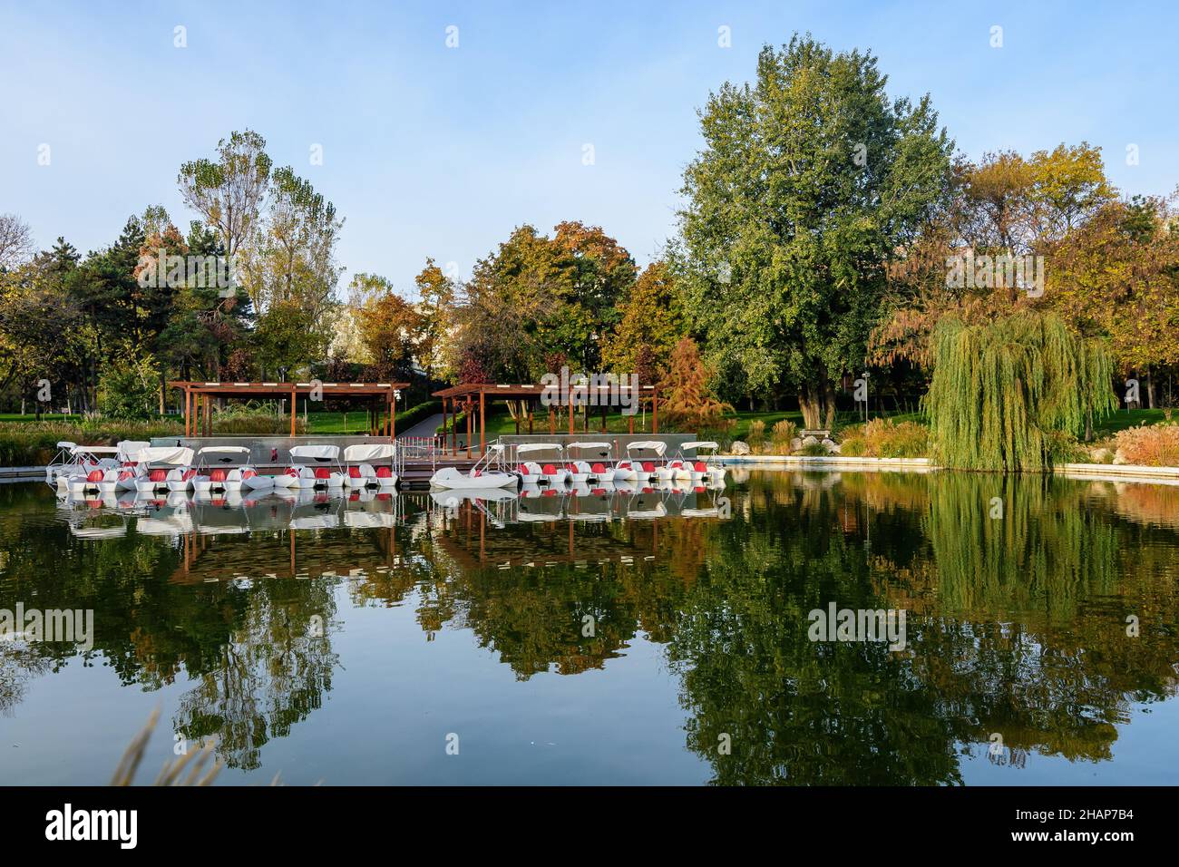 Landscape with the lake and green and yellow trees in Drumul Taberei ...