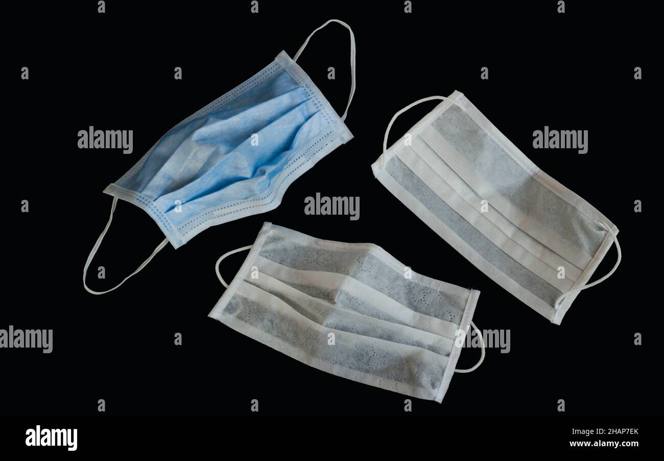 Top view of Medical,hygenic face mask on black background with copy ...