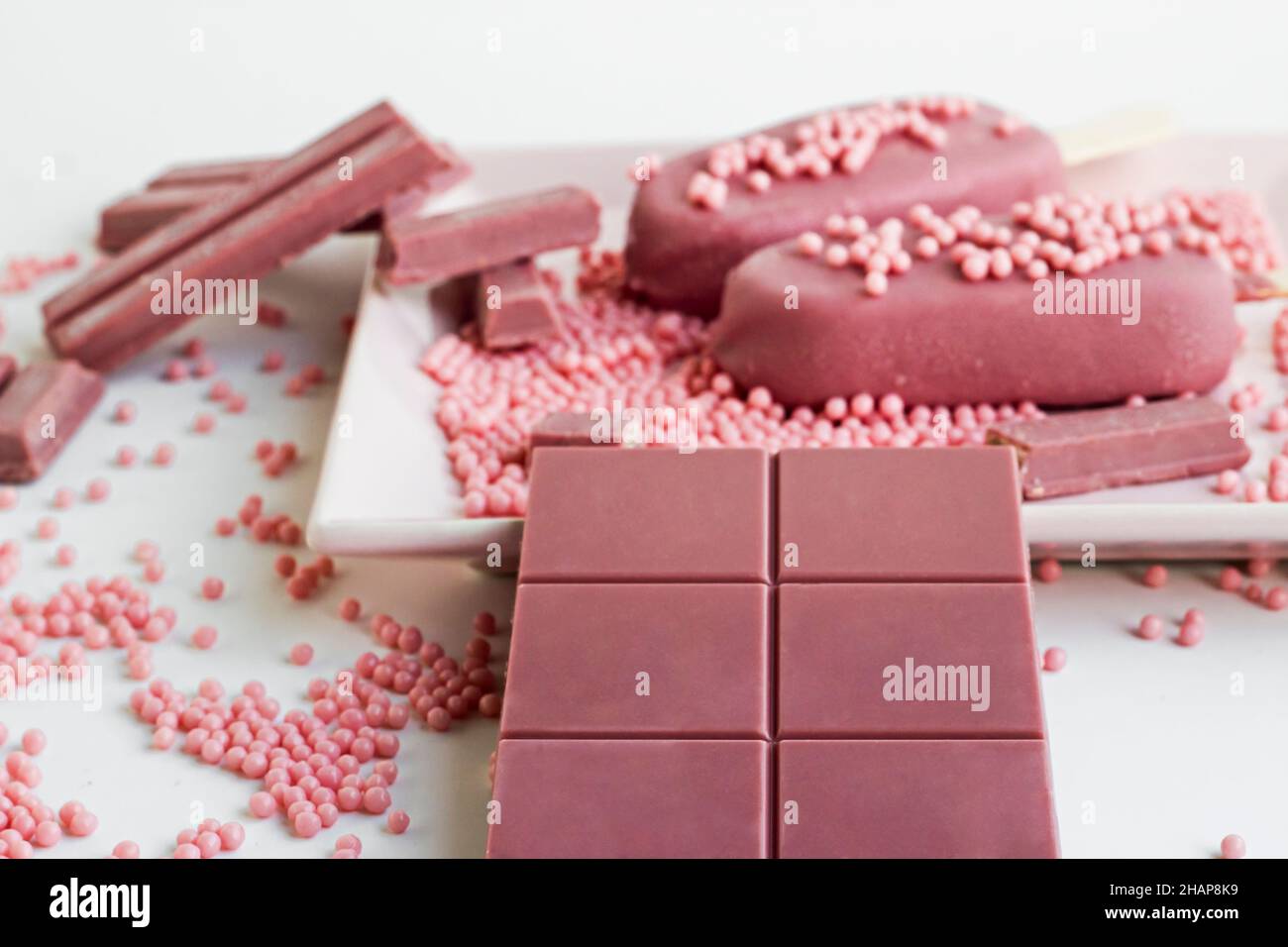 The fourth type in chocolate: Ruby chocolate bar and ice cream on the ...