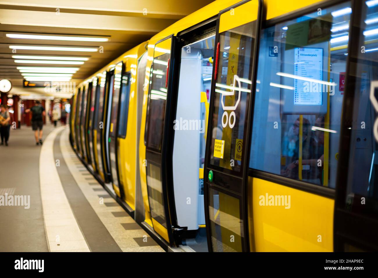 Modern subway. Yellow train at the station Stock Photo - Alamy