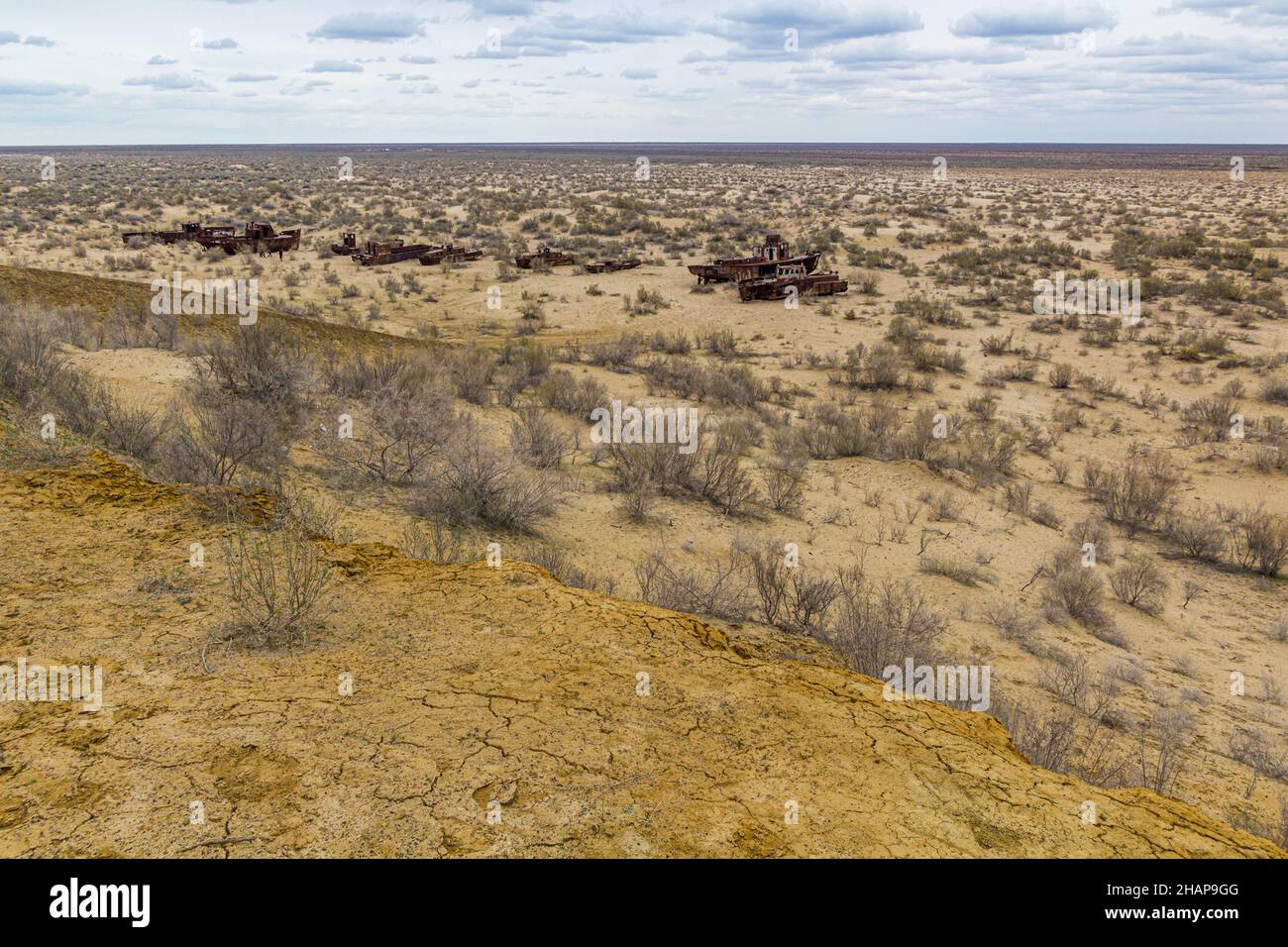 Rusty ships at the ship graveyard in former Aral sea port town Moynaq ...