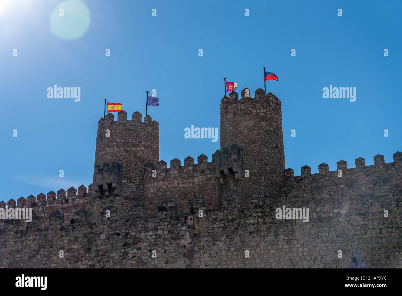 View of Castle External Wall with Two Towers and Multiple Flags Stock ...