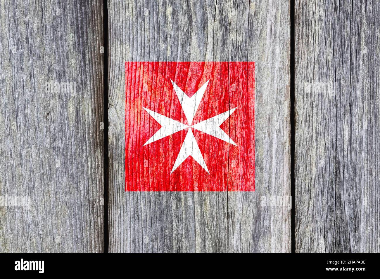 Grunge pattern of Maltese cross isolated on weathered wooden fence ...