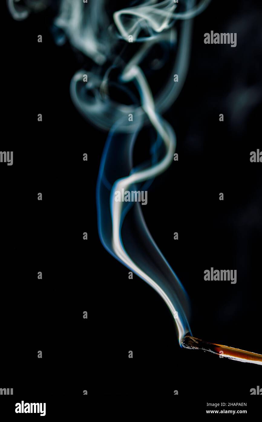 smoke of a burnt matchstick Stock Photo - Alamy
