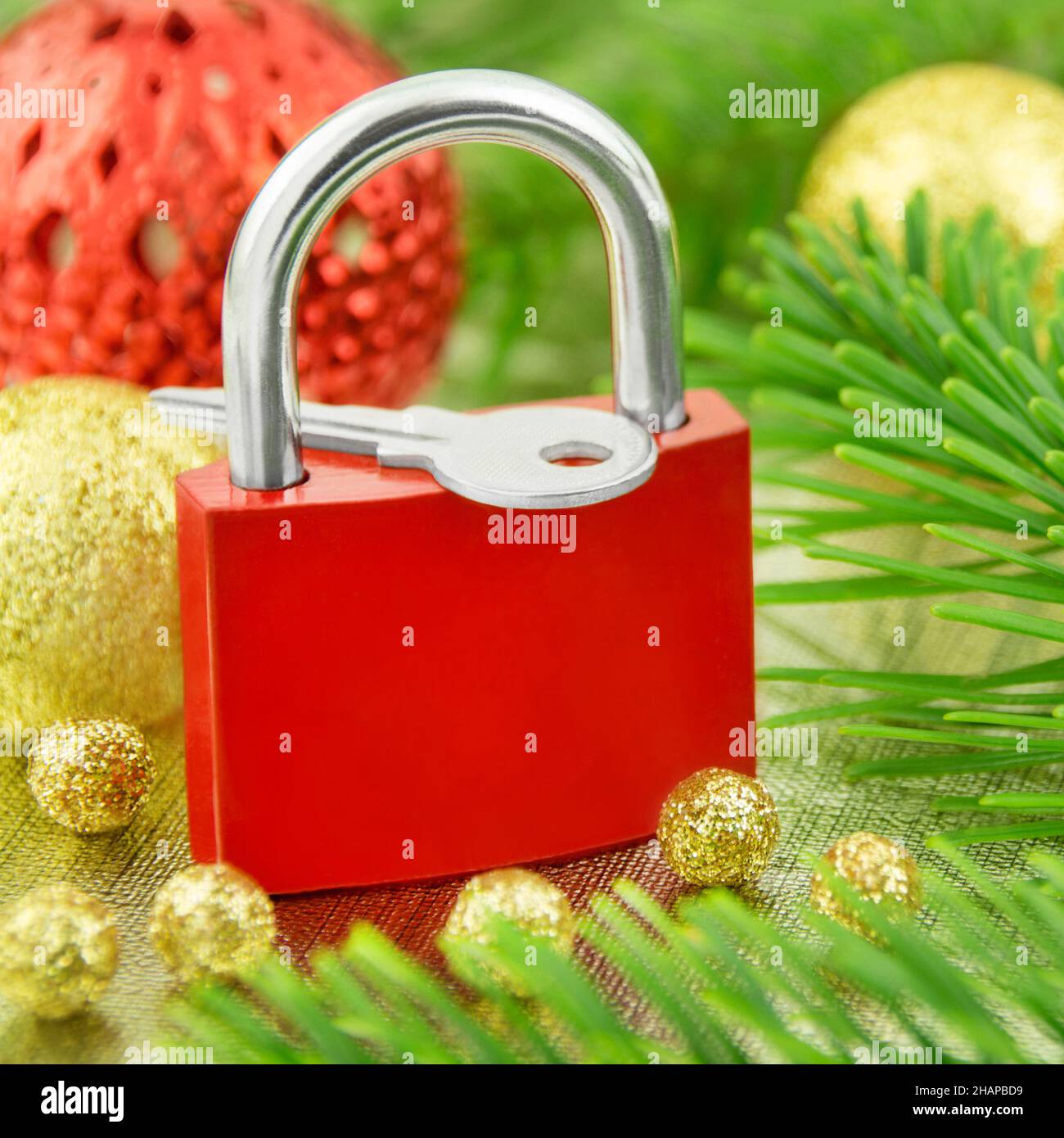 Red symbolic padlock and Christmas decoration Stock Photo - Alamy