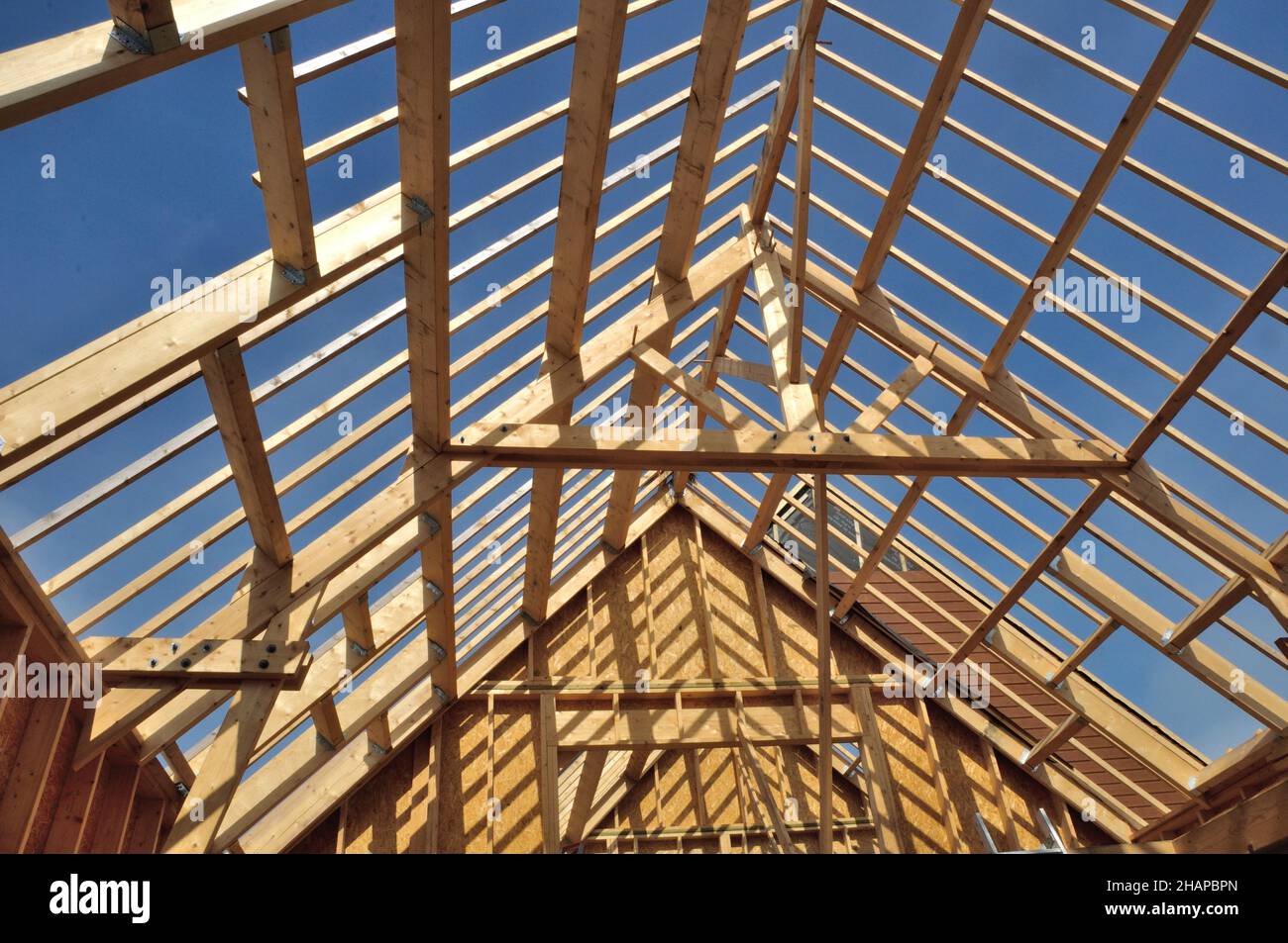 Construction of a wooden house Stock Photo - Alamy