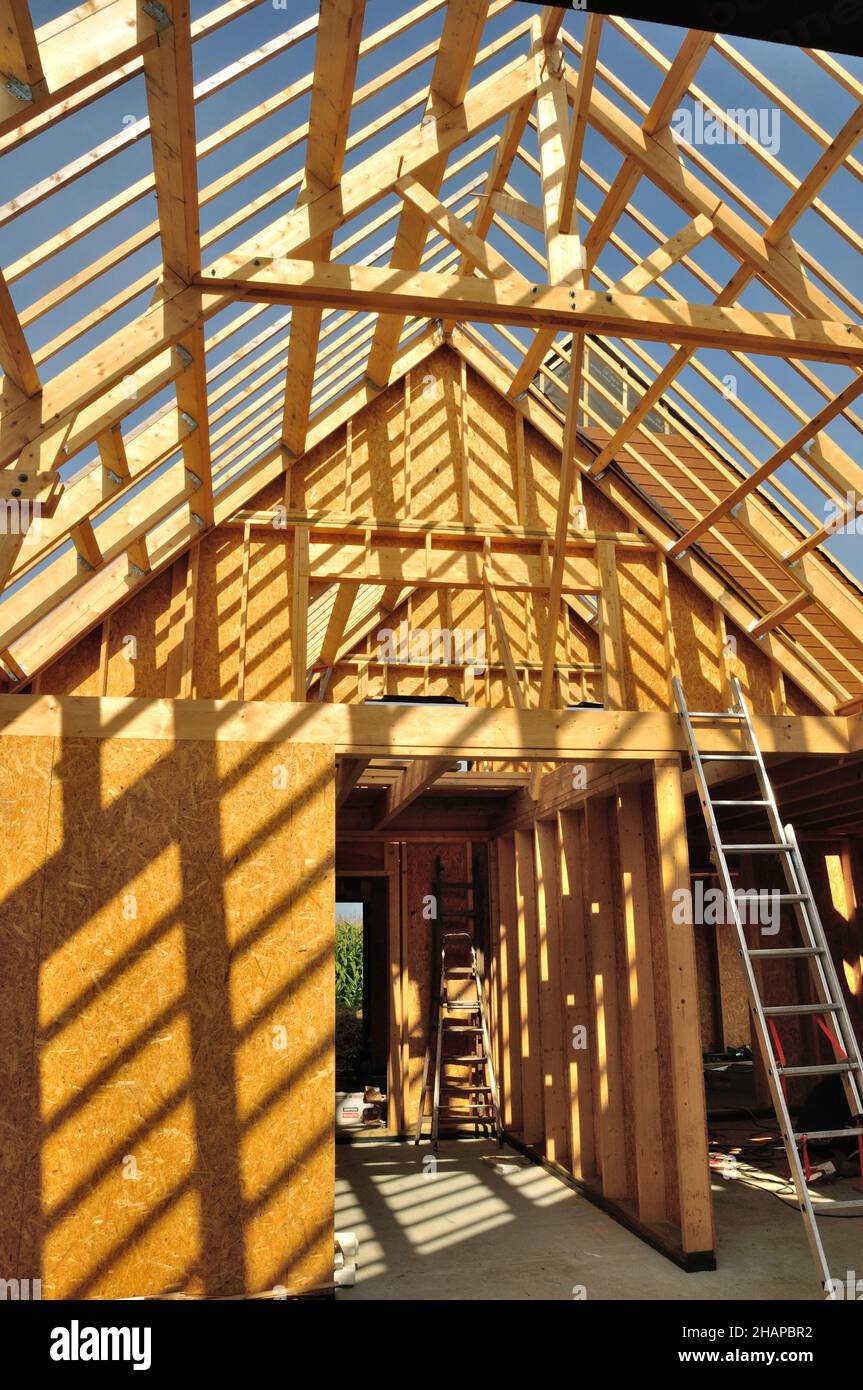 Construction of a wooden house Stock Photo - Alamy