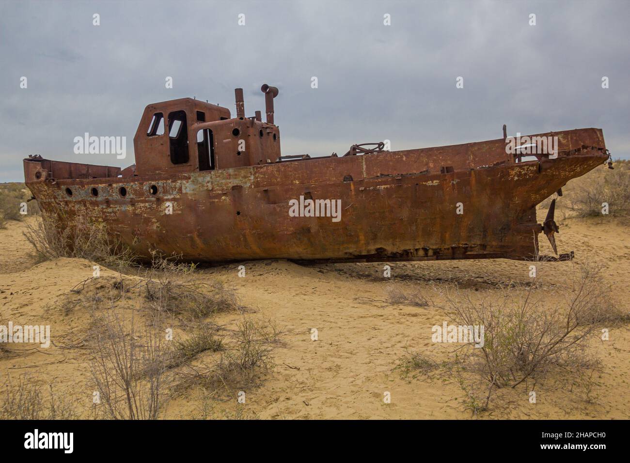 Rusty ship at the ship graveyard in former Aral sea port town Moynaq Mo ...