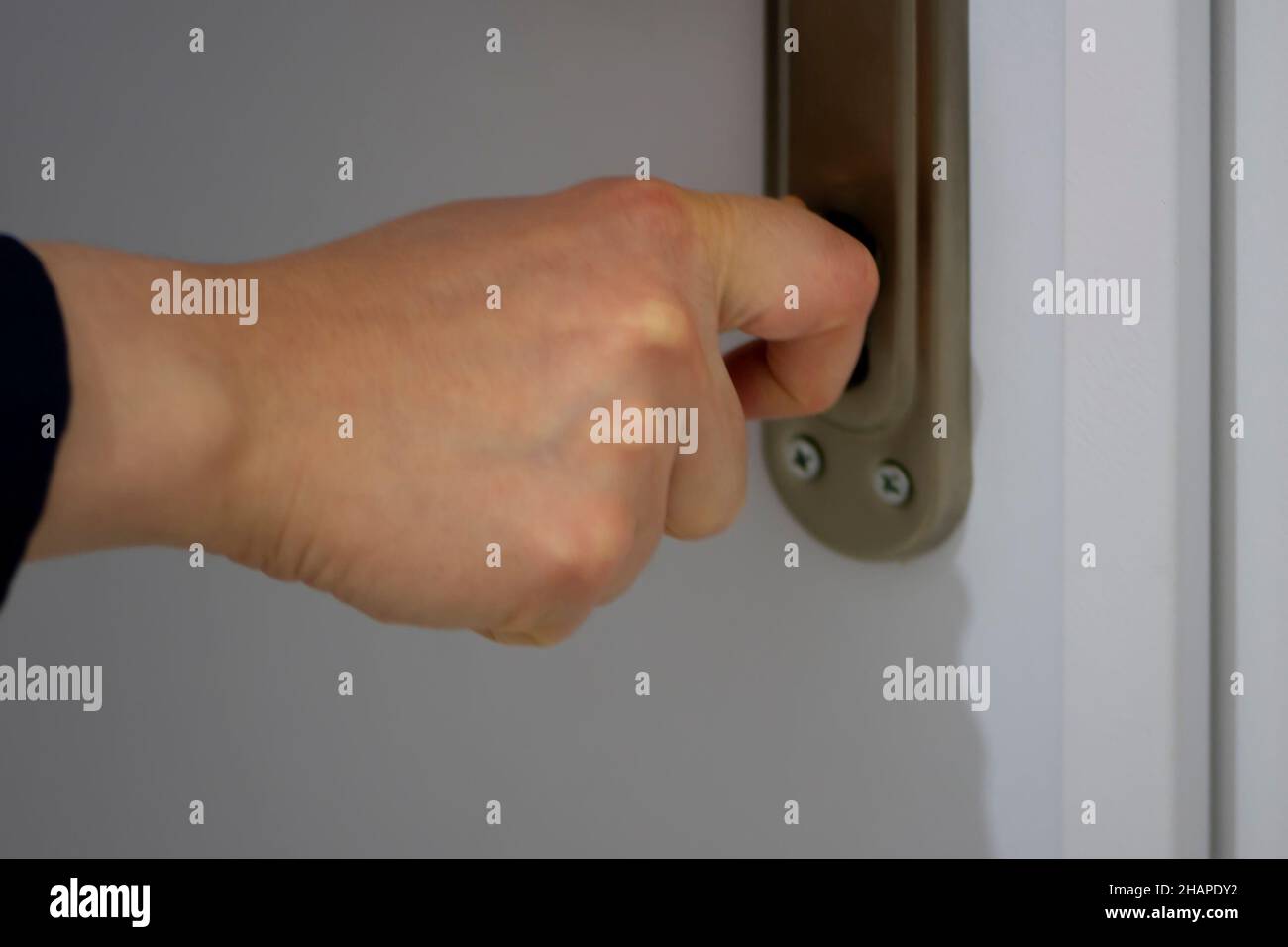 Woman alone unlocking house door hi-res stock photography and images ...