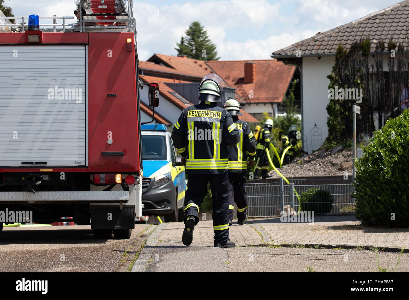 Closeup of German firefighters hard at work during daylight Stock Photo ...