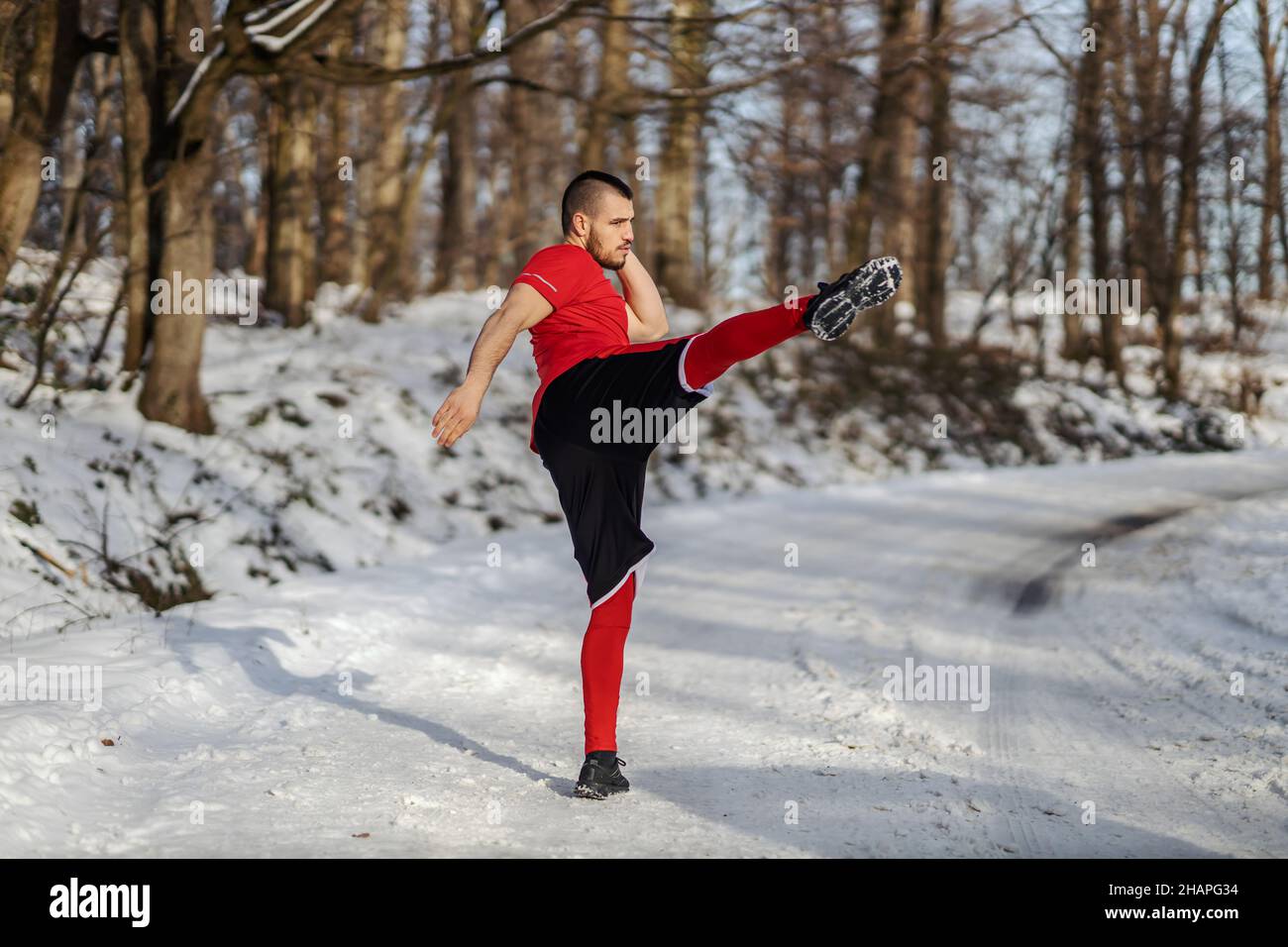 Strong muscular fighter sparring in nature at snowy winter day. Boxing ...