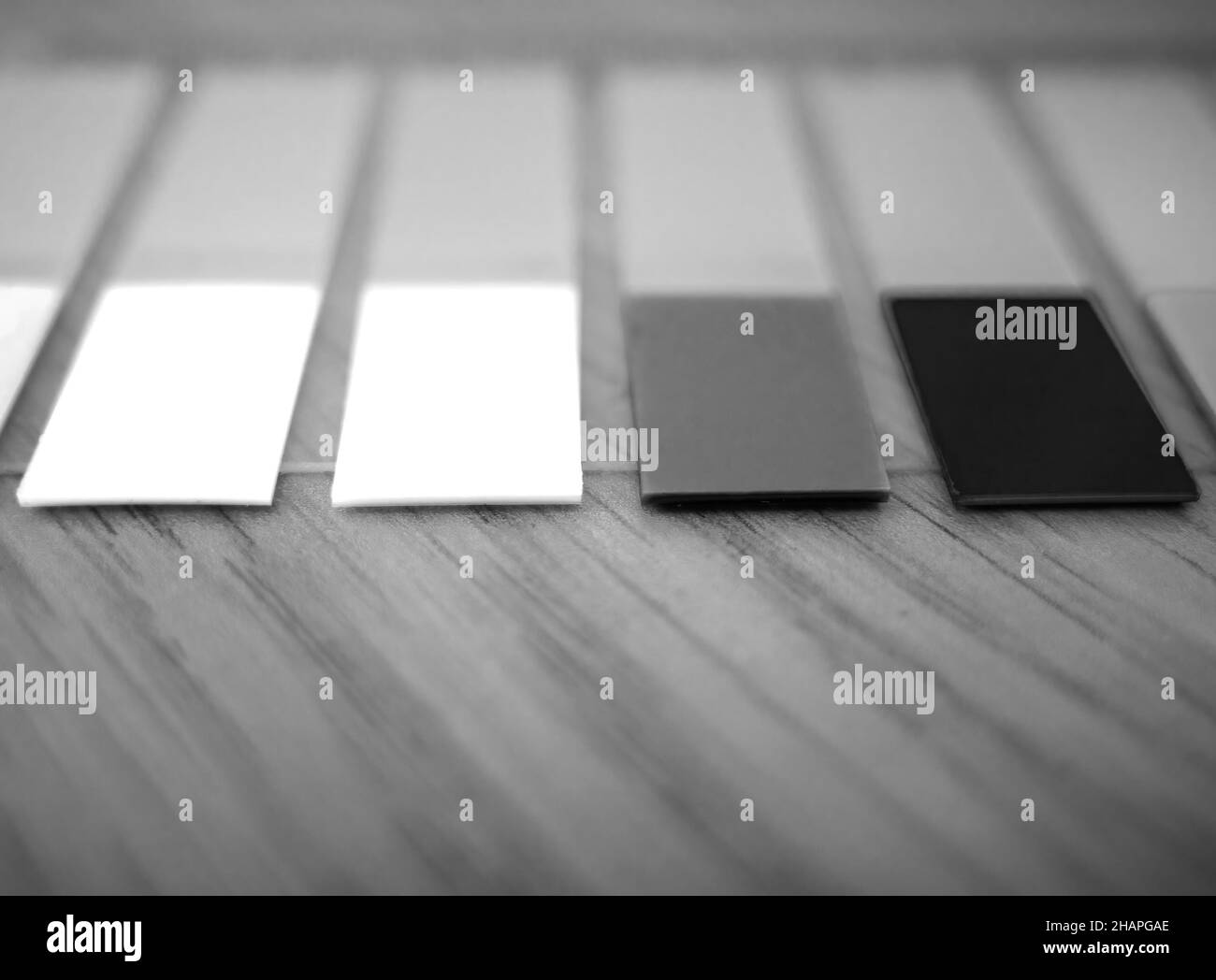 Office stickers on wooden table backdrop Stock Photo - Alamy
