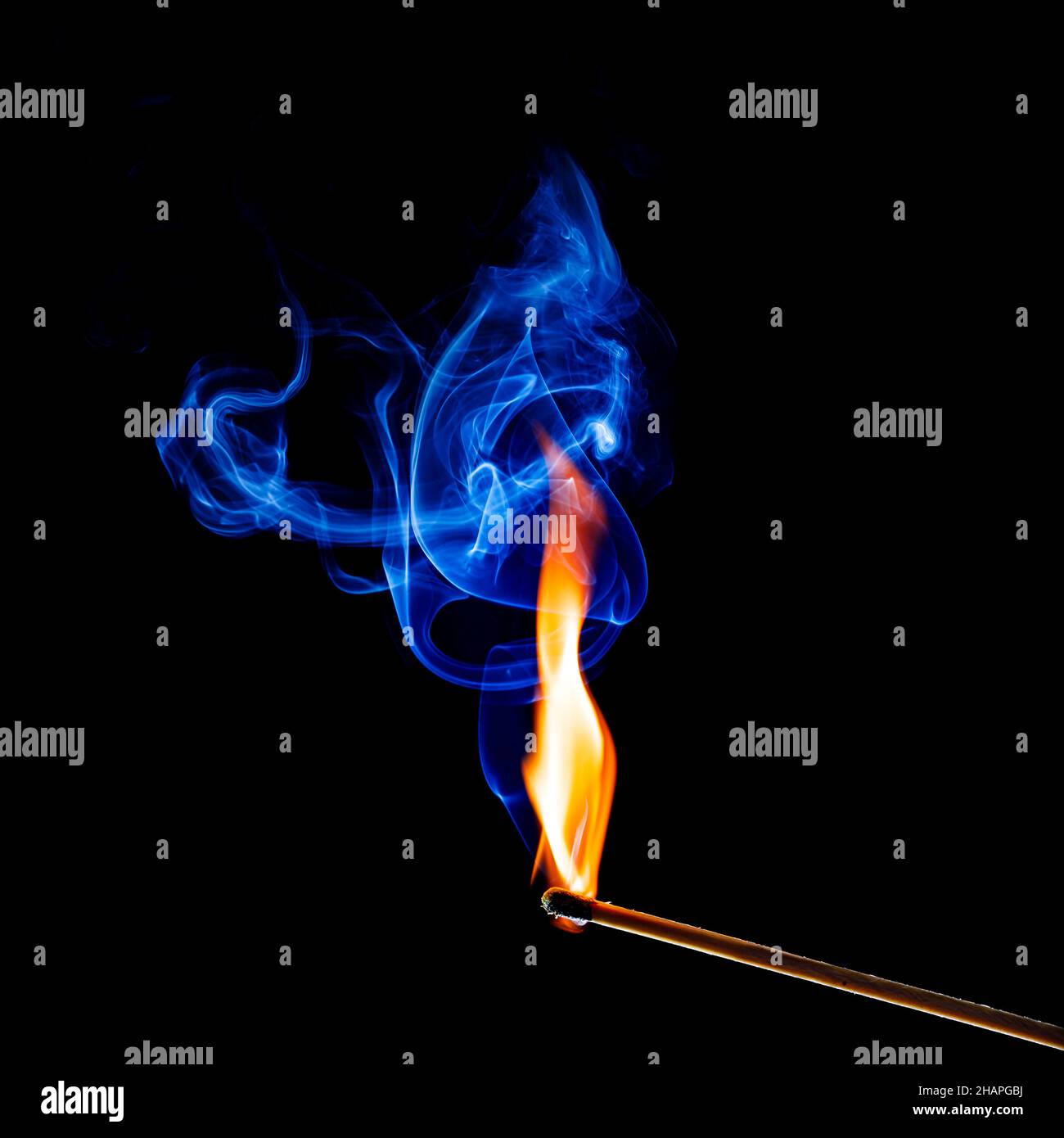 flame and smoke of a matchstick on black background Stock Photo - Alamy