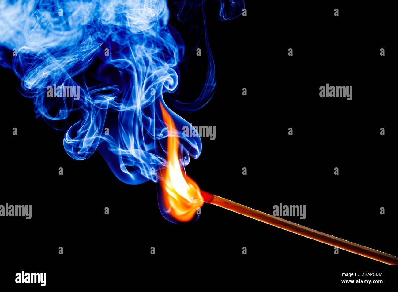 flame and smoke of a matchstick on black background Stock Photo - Alamy