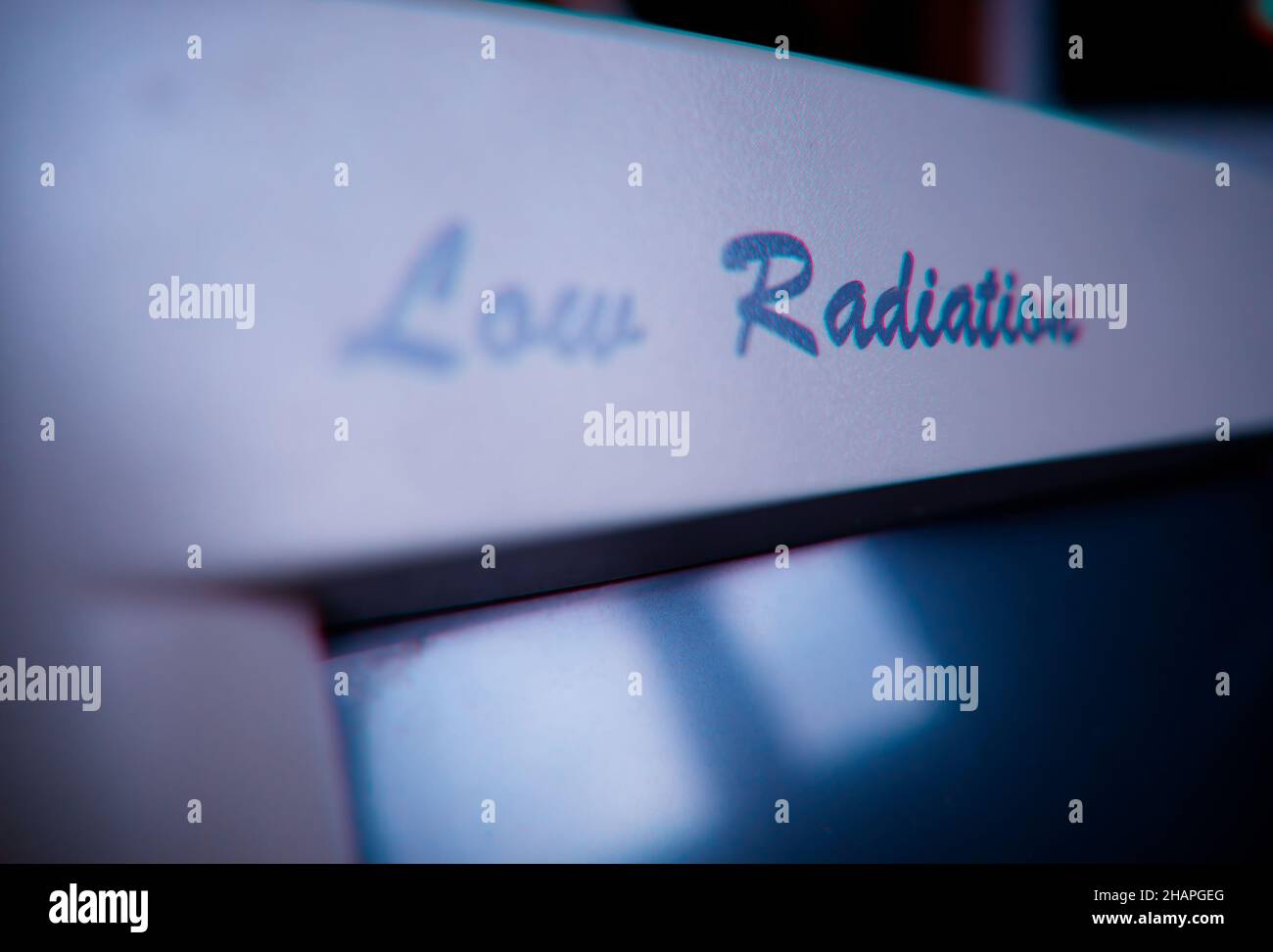 Low radiation sign on CRT monitor background Stock Photo - Alamy