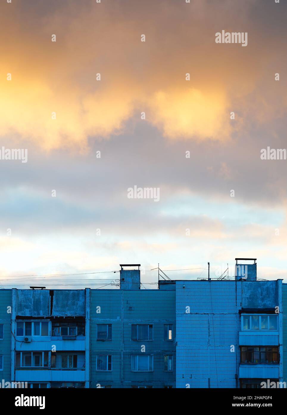 Sunset roof of Moscow industrial area vertical Stock Photo - Alamy