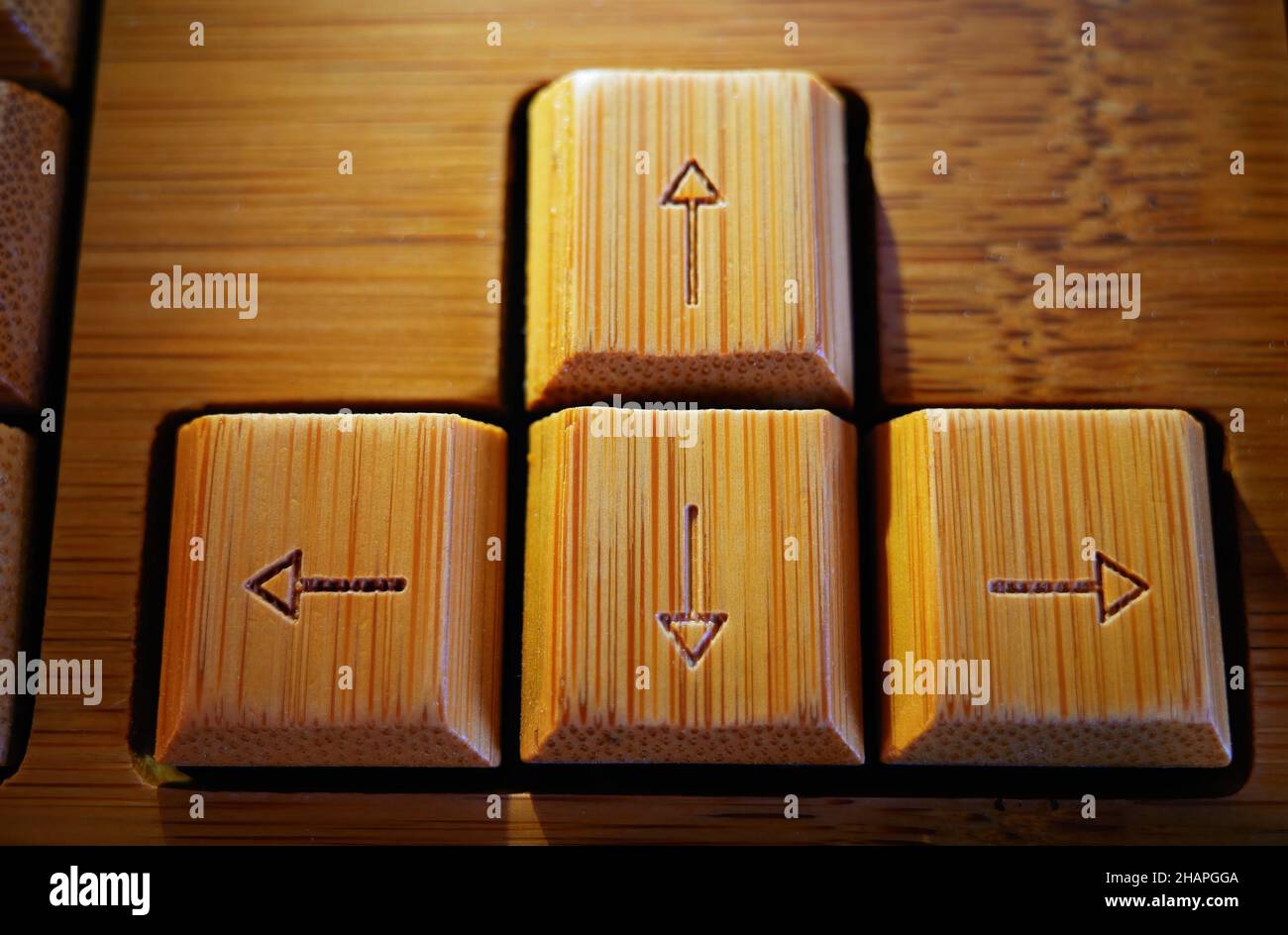 Arrows control keys of bamboo keyboard Stock Photo - Alamy