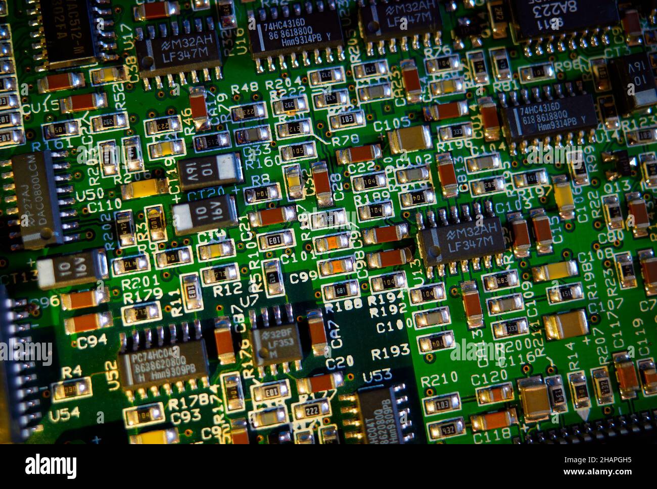 Vibrant green computer pcb texture background Stock Photo - Alamy