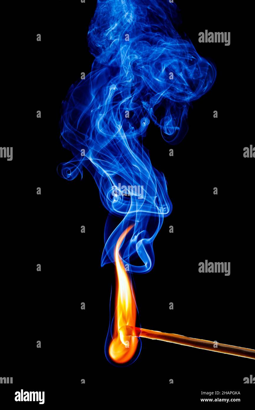 flame and smoke of a matchstick on black background Stock Photo - Alamy