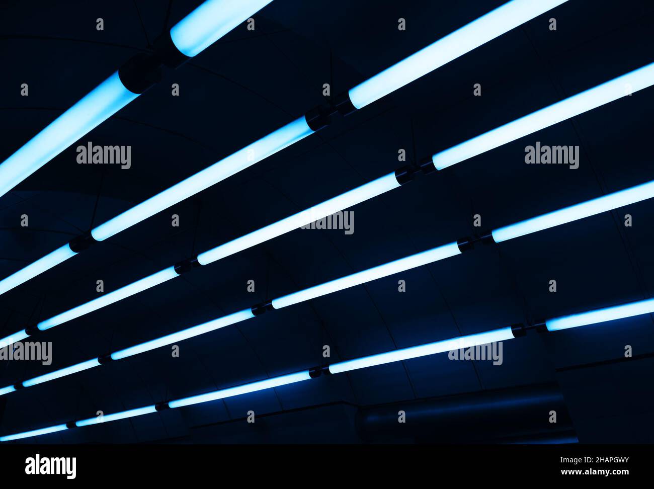Diagonal futuristic led lamps background Stock Photo - Alamy