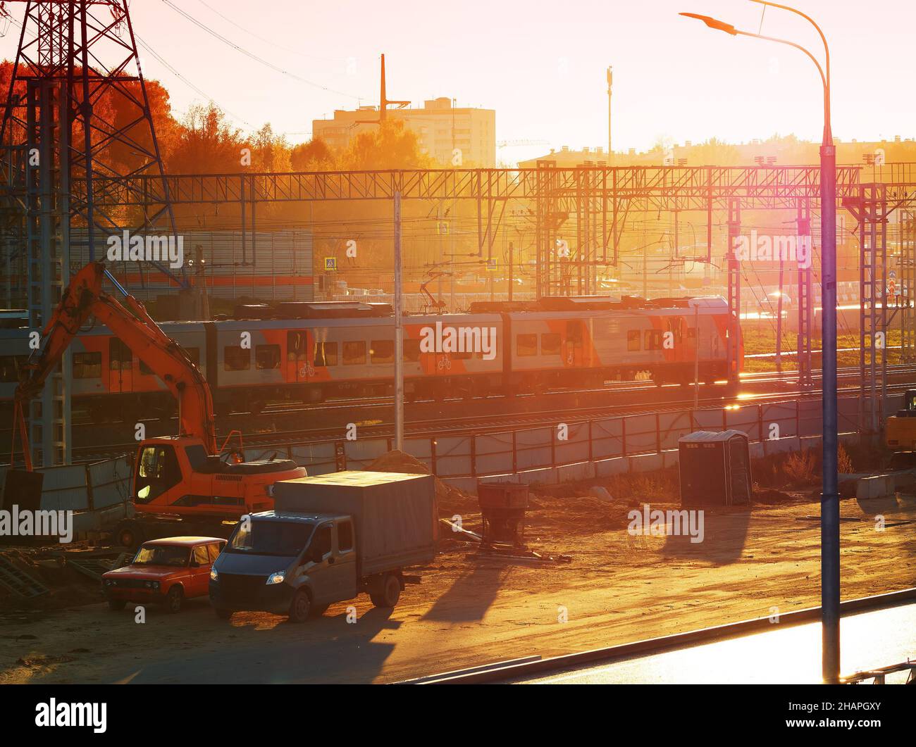 Railway track during dramatic sunset background Stock Photo - Alamy
