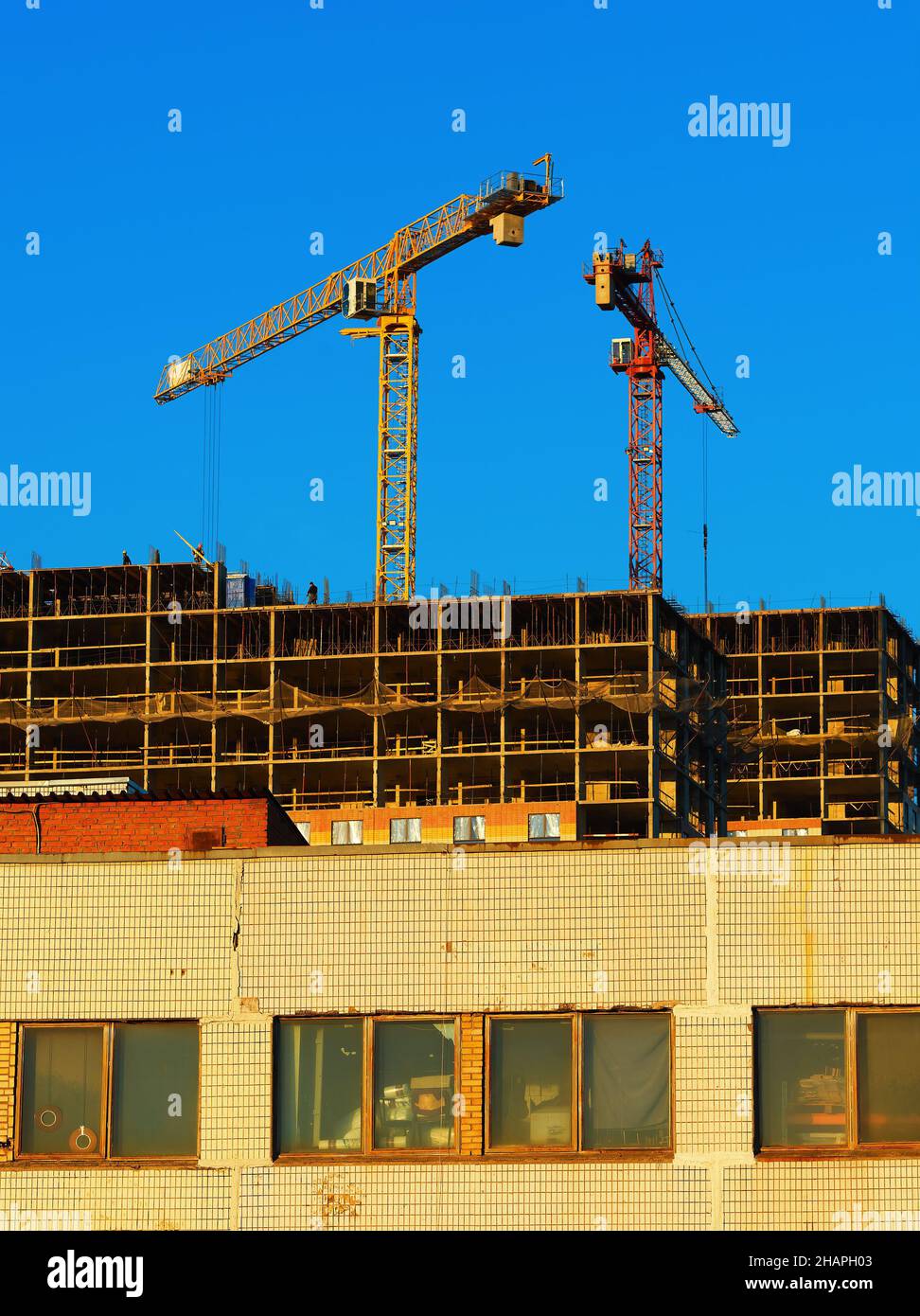 Construction of the city buildings background Stock Photo - Alamy